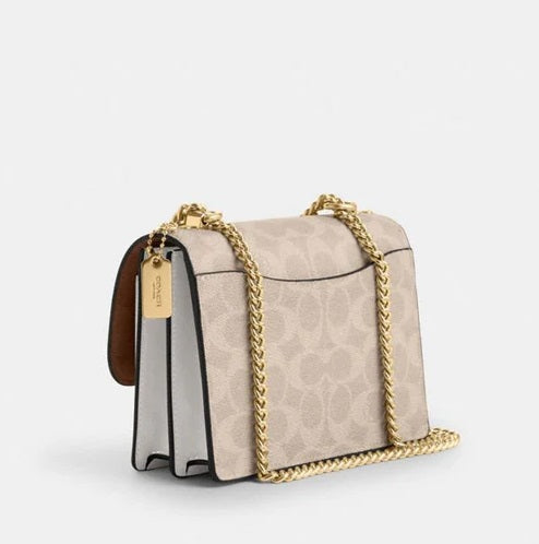 COACH CW206 MINI KLARE CROSSBODY SIGNATURE CANVAS CREAM – cadysdeluxe.com